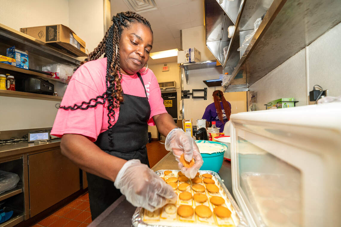 Family, fried fish at Bryant Seafood in Charlotte NC | Charlotte Observer